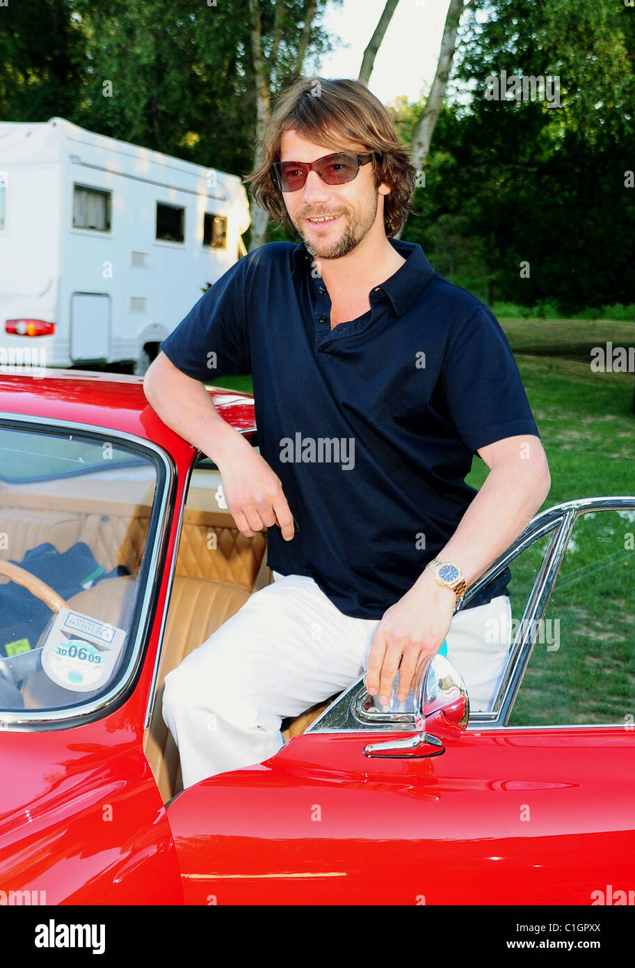 Singer Jay Kay getting into his Ferrari at the Charity Polo Match at ...