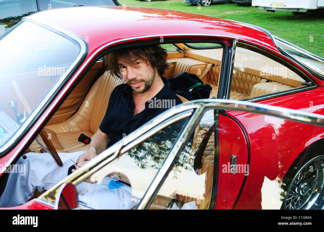 Singer Jay Kay in his Ferrari at the Charity Polo Match at the Guards ...