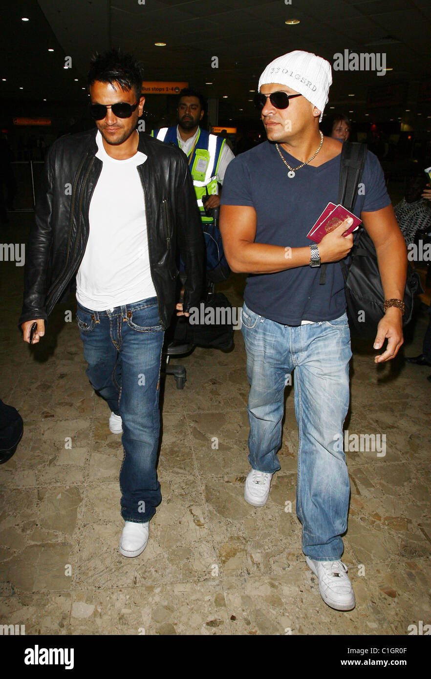 Peter Andre arrives at Heathrow Airport with his manager and brother ...