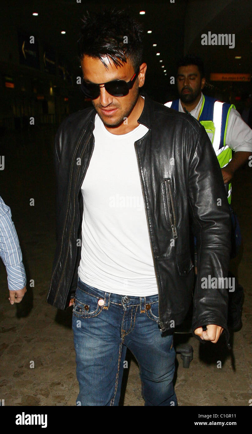 Peter Andre arrives at Heathrow Airport with his manager and brother ...