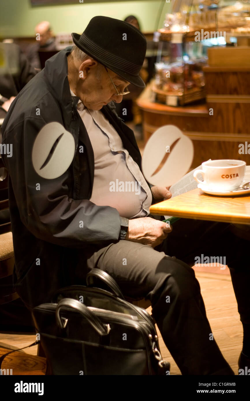 Fat man drinking coffee hi-res stock photography and images - Alamy