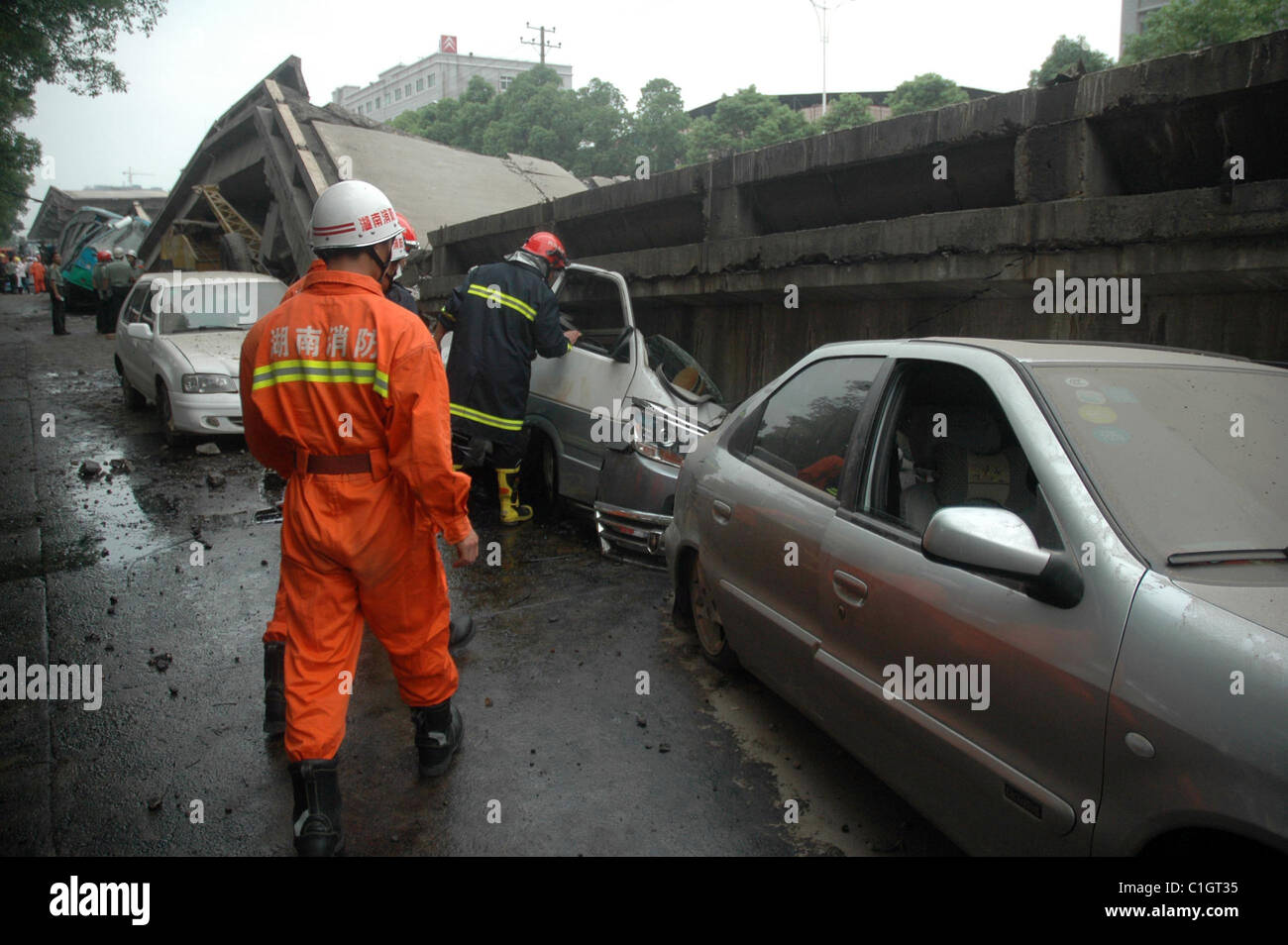 Viaduct collapse in China Rescuers investigate the rubble after a ...