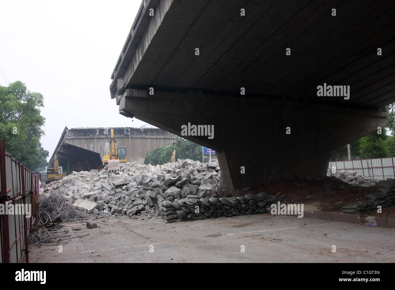 Viaduct collapse in China Rescuers investigate the rubble after a ...