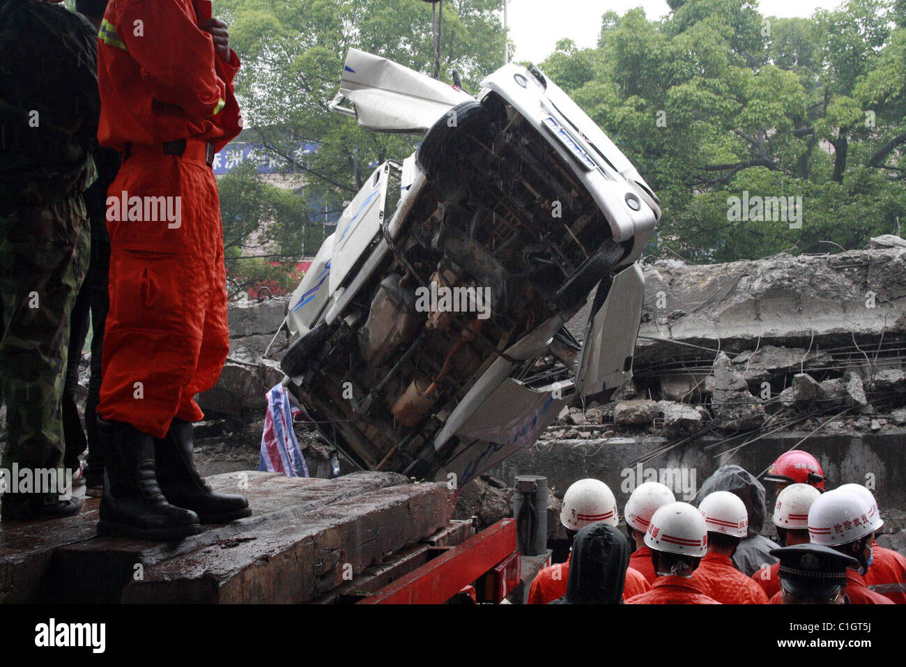 Viaduct collapse in China Rescuers investigate the rubble after a ...