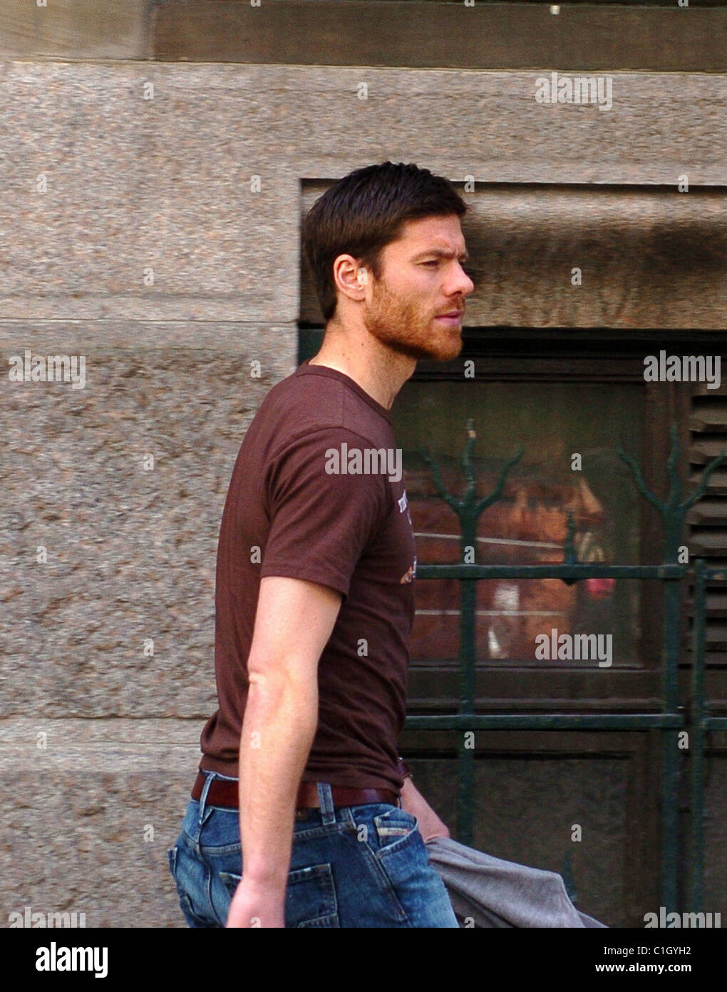 Xabi Alonso leaving Jamie Carragher's Cafe Sports bar after celebrating ...