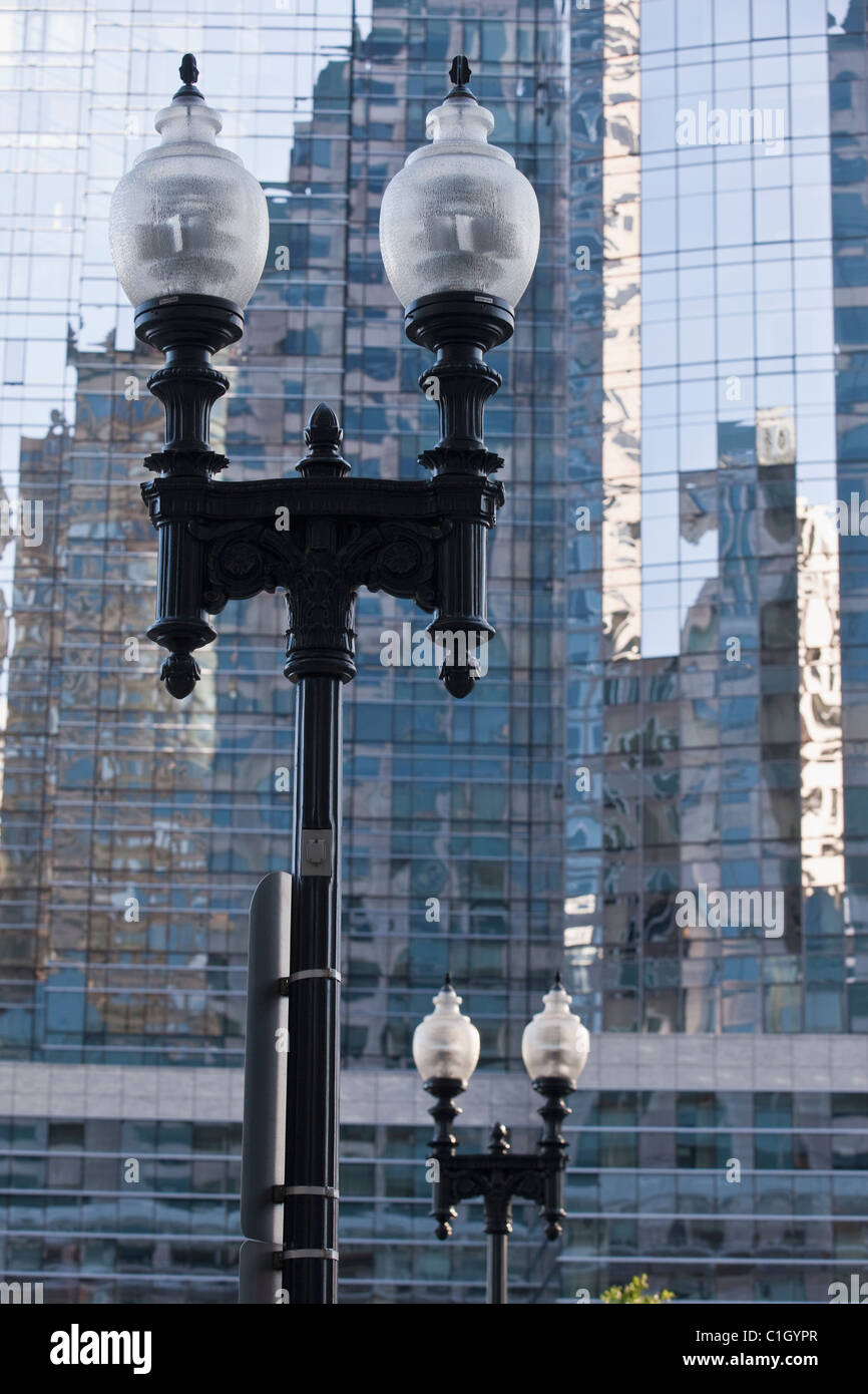 Gas lights in front of a building, Atlantic Avenue, Boston ...
