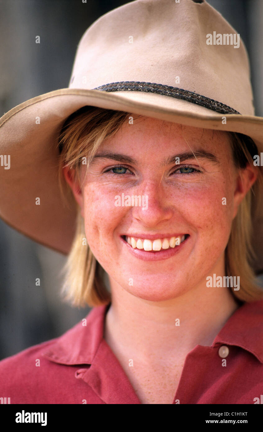 Australia, Northern Territory, young woman in a bushfarm around Alice ...