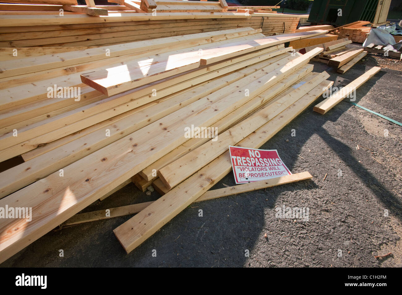 No Trespassing sign on pile of boards Stock Photo - Alamy
