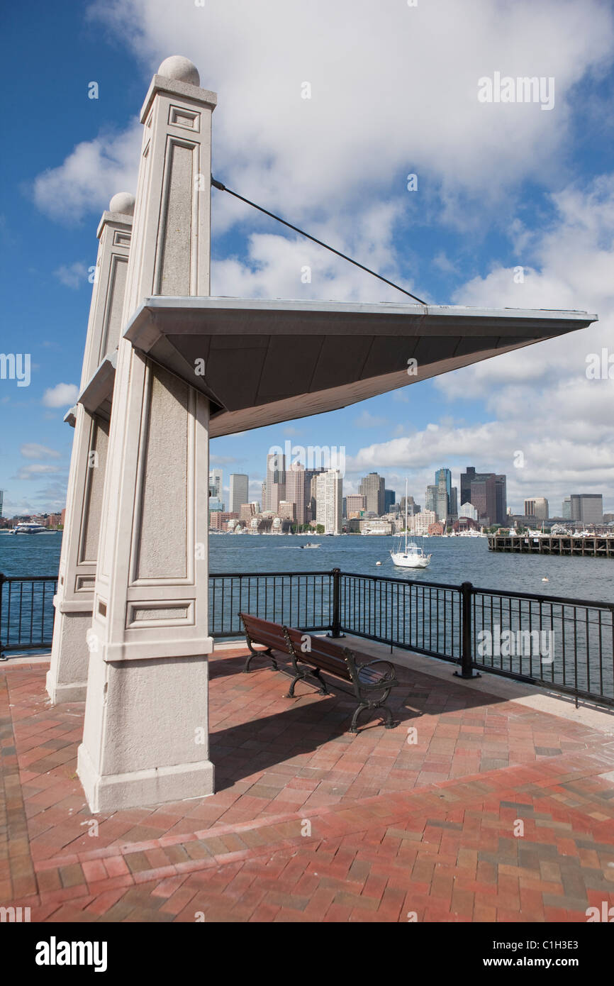 Sculpture at a harbor with city in the background, Boston Harbor, East ...
