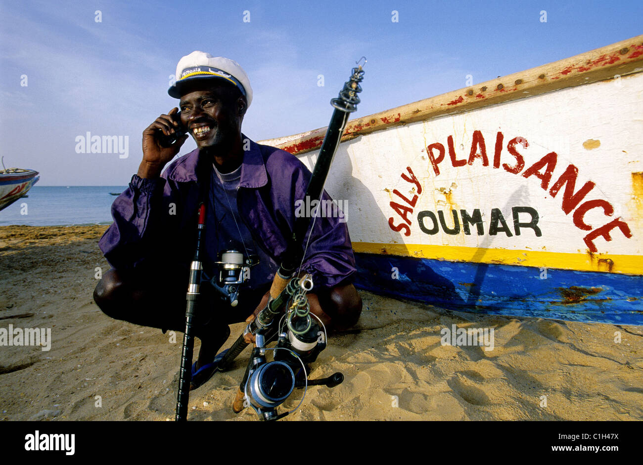 Captain Diallo rents his outrigger to tourists wishing to fishgame Saly ...