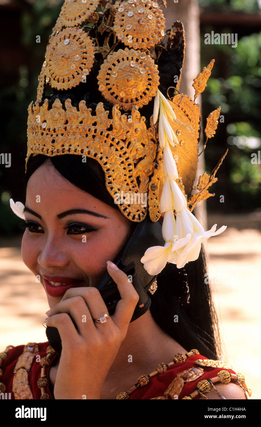Cambodia, woman in traditionnal dress phoning Stock Photo - Alamy