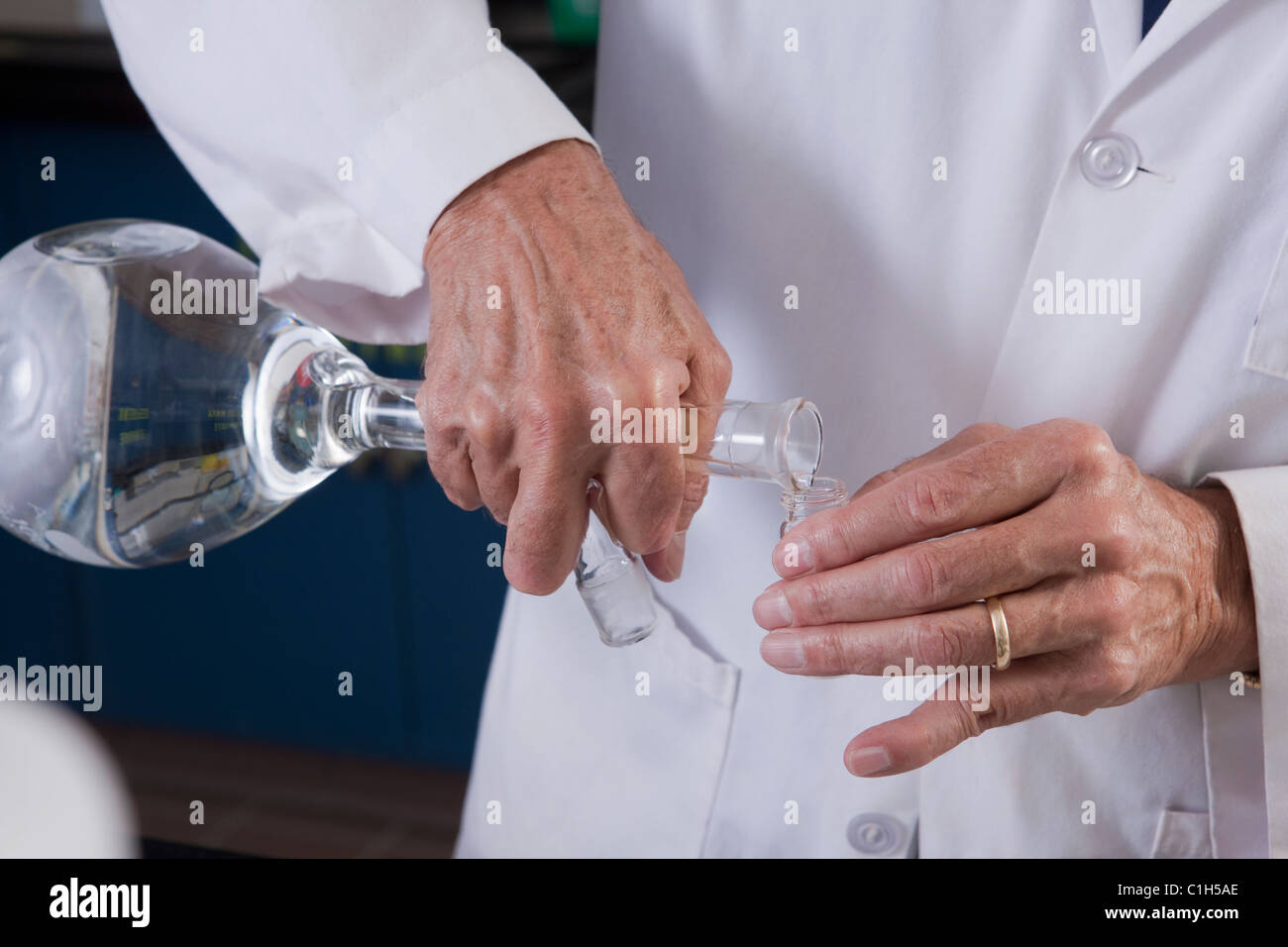 Examining A Vial High Resolution Stock Photography and Images - Alamy