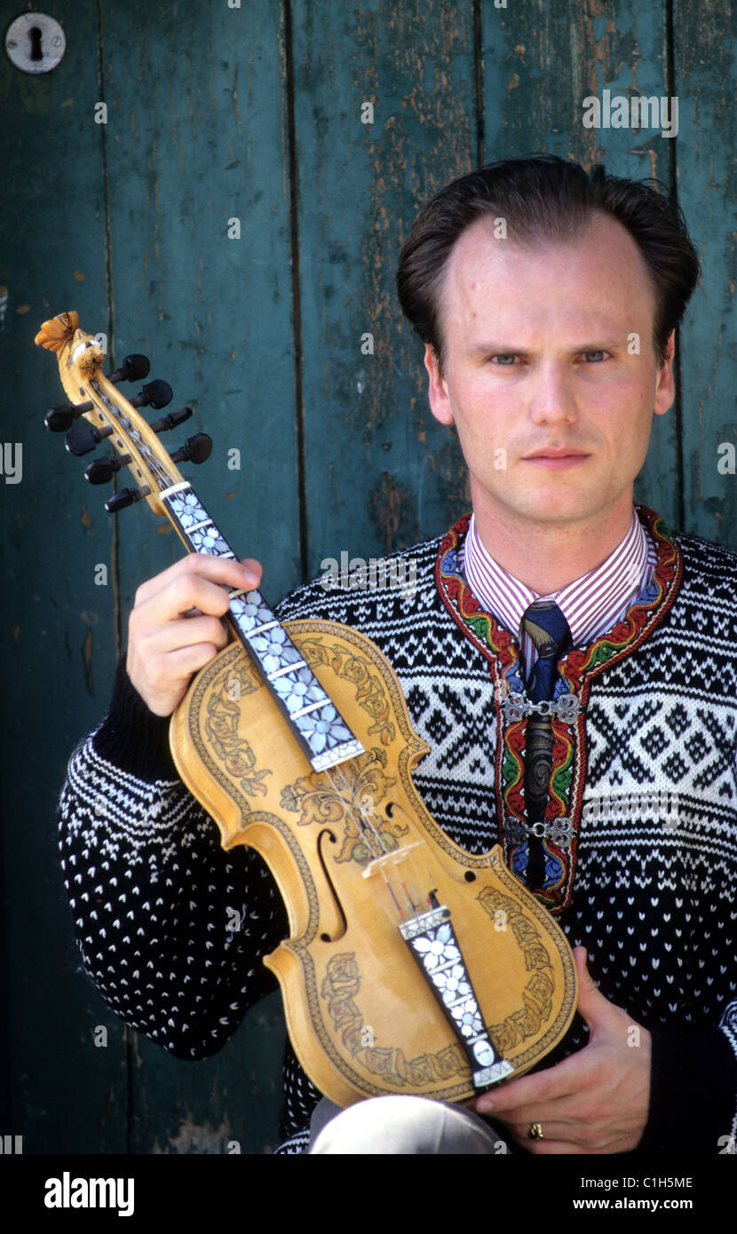 Norway, South Norway, young musician and his decorated violin of ...