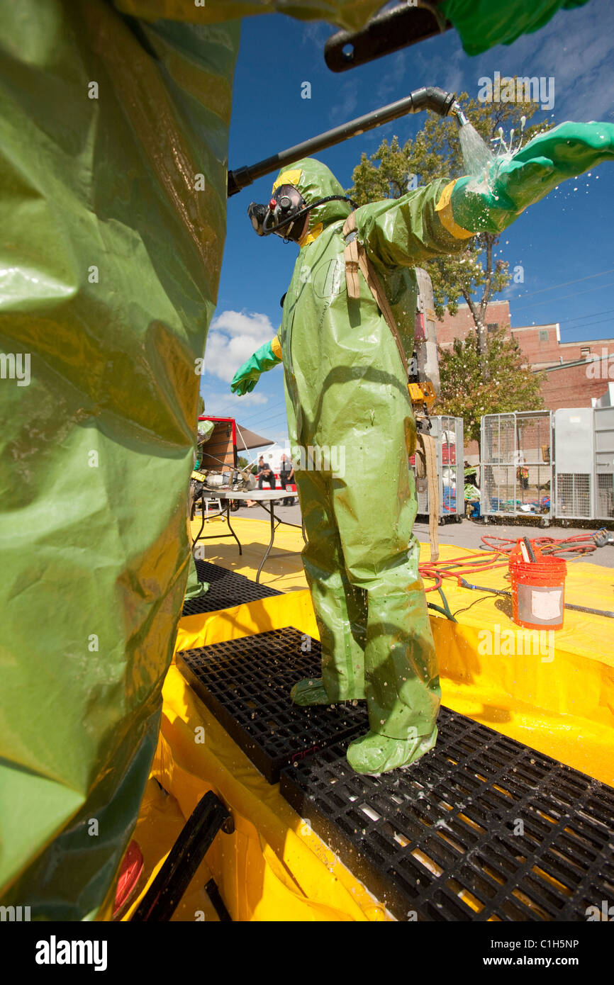 Hazmat decontamination people hi-res stock photography and images - Alamy