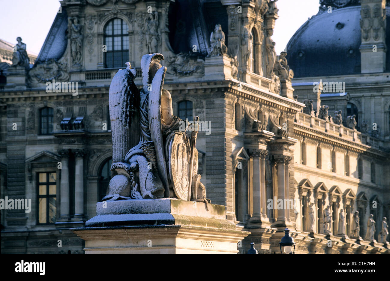 France, Paris, statue of the Louvre under the snow Stock Photo - Alamy