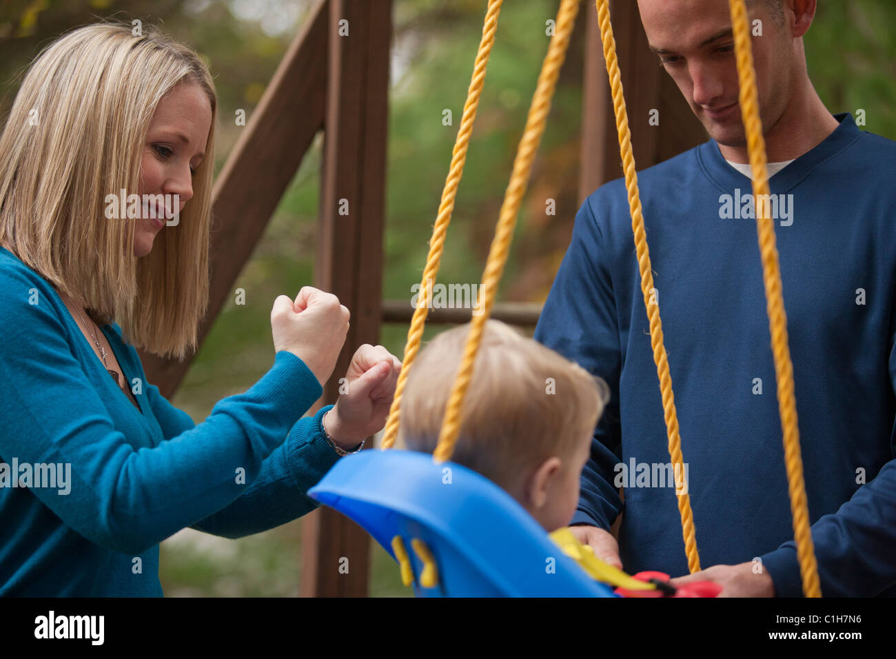 Woman signing the word 'Fix' in American Sign Language while ...