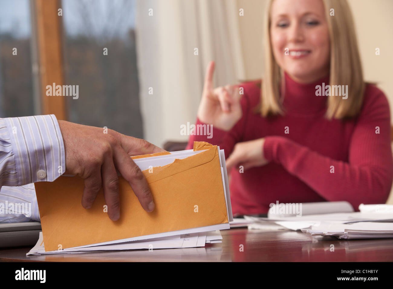 Woman and man signing the word 'House' in American Sign Language Stock ...