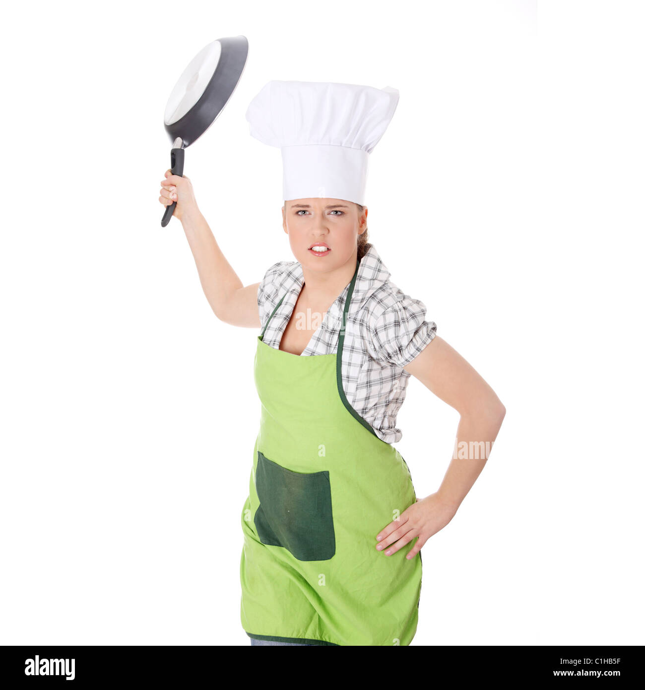 Angry young woman cooking , isolated on white Stock Photo - Alamy