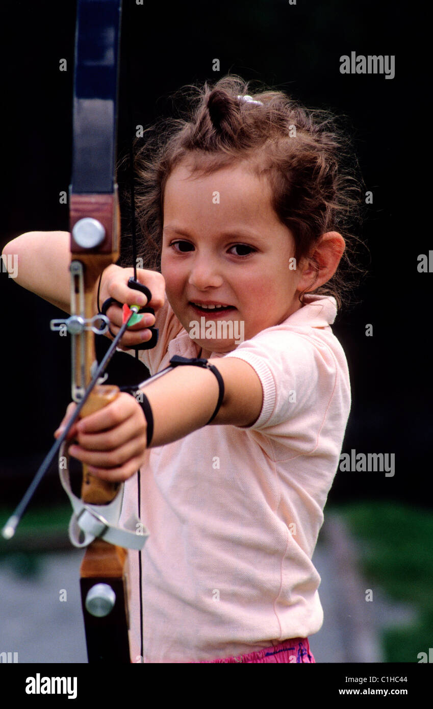 France , Child doing archery Stock Photo - Alamy