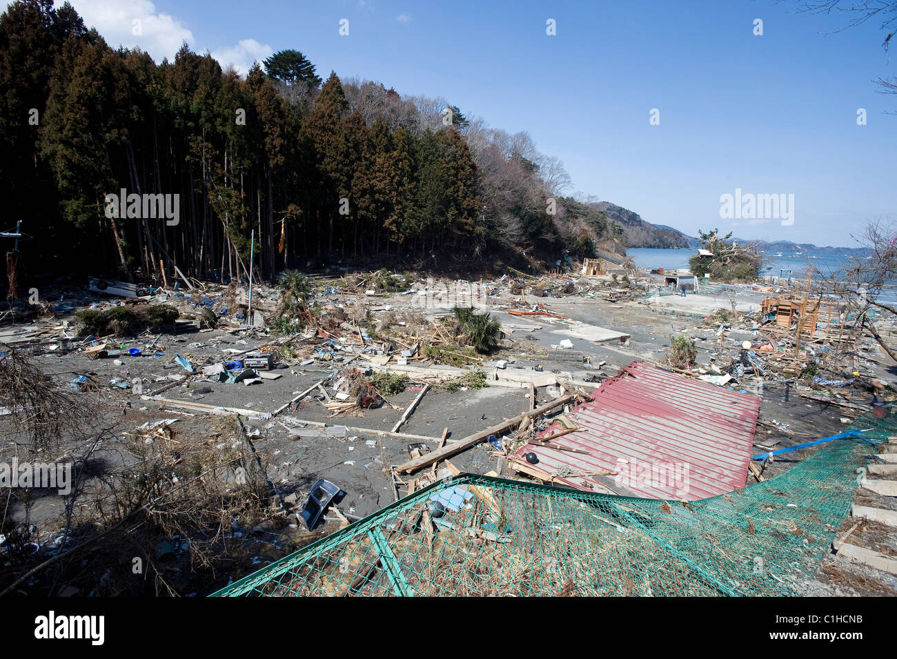Photo shows the battered remains of a community on the Oshika Peninsula ...