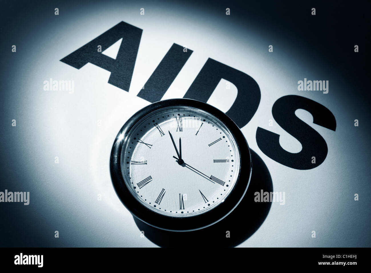 Clock word AIDS for background Stock Photo - Alamy