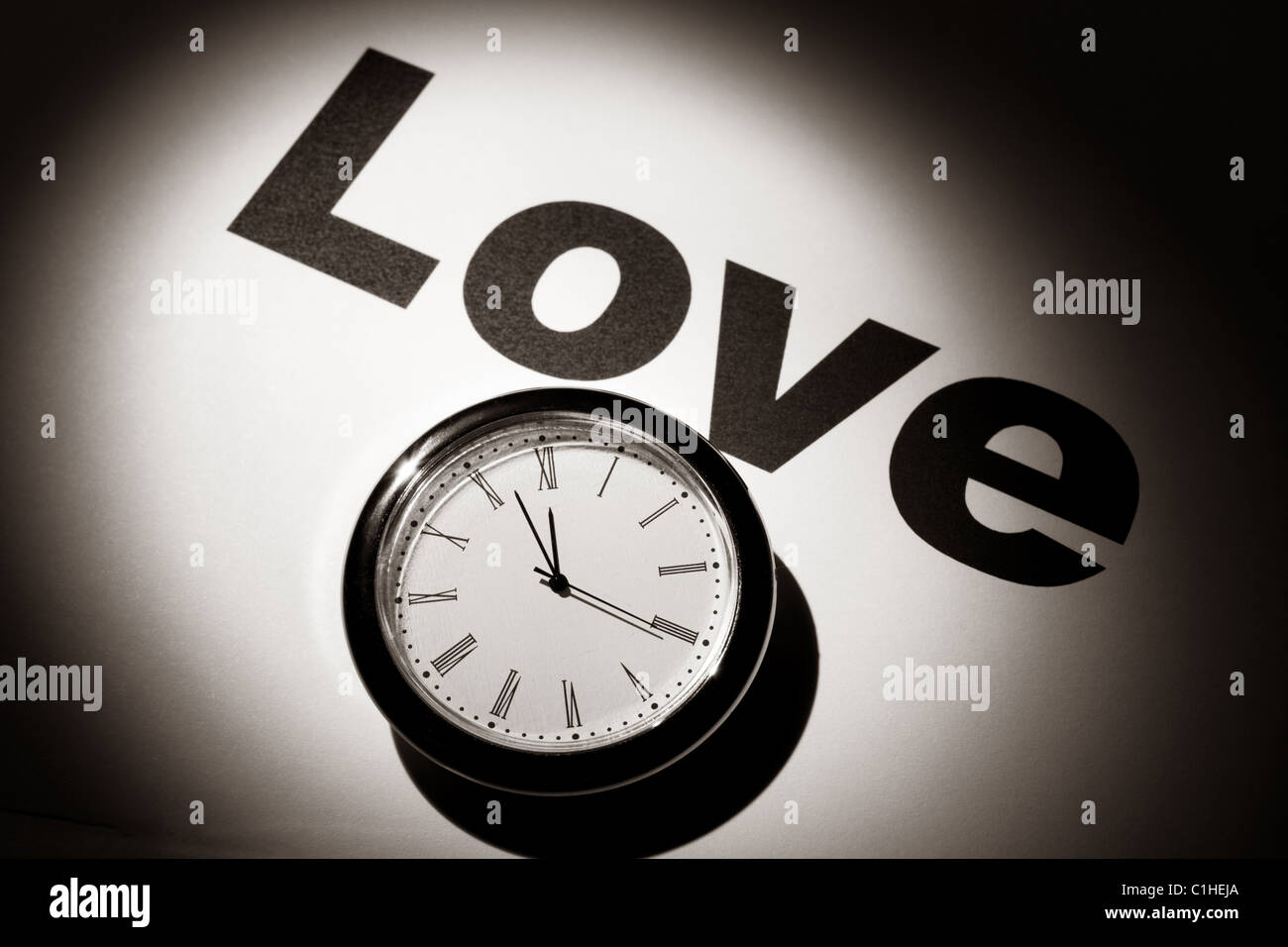 Clock and word of Love for background Stock Photo - Alamy