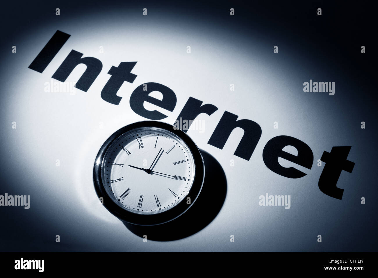 Clock and word of Internet for background Stock Photo - Alamy
