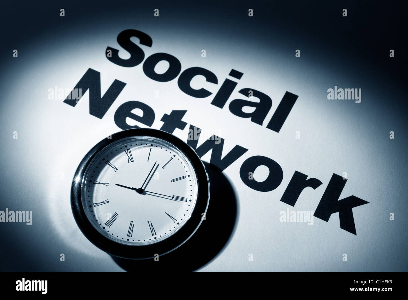 Clock and word of Social Network for background Stock Photo - Alamy