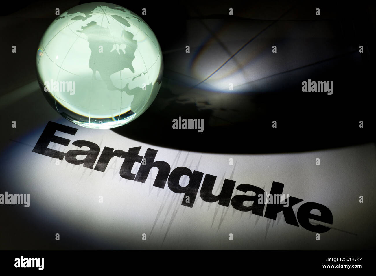 Globe and word of Earthquake Stock Photo - Alamy