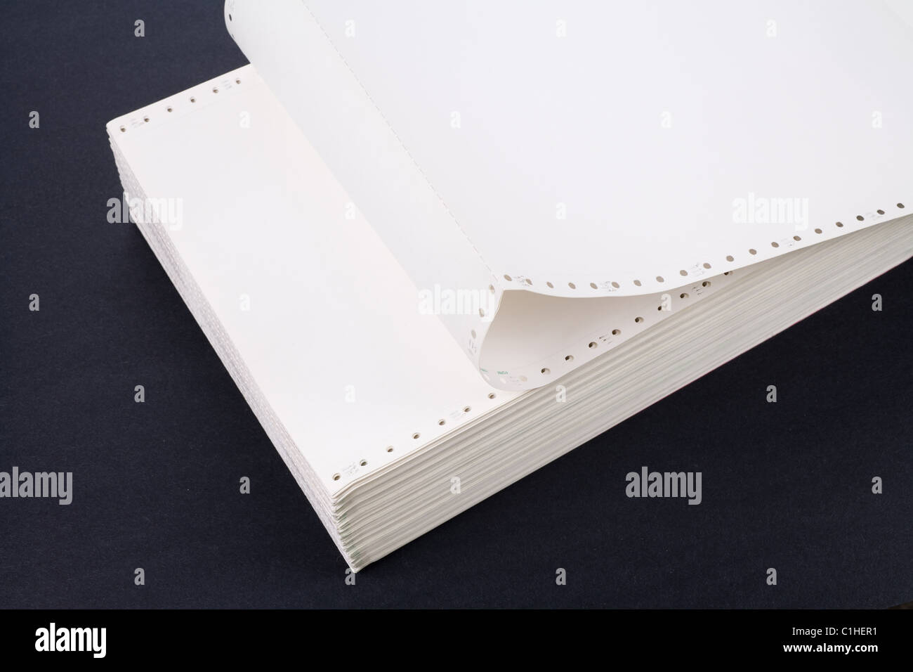 Perforated Computer Paper for background Stock Photo - Alamy