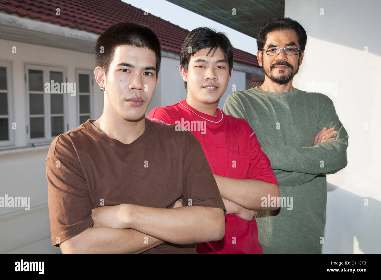 Portrait of Thai father and his two sons Stock Photo - Alamy