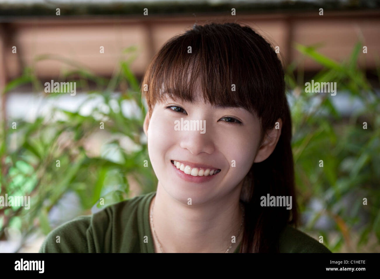 Portrait of a young woman Stock Photo - Alamy