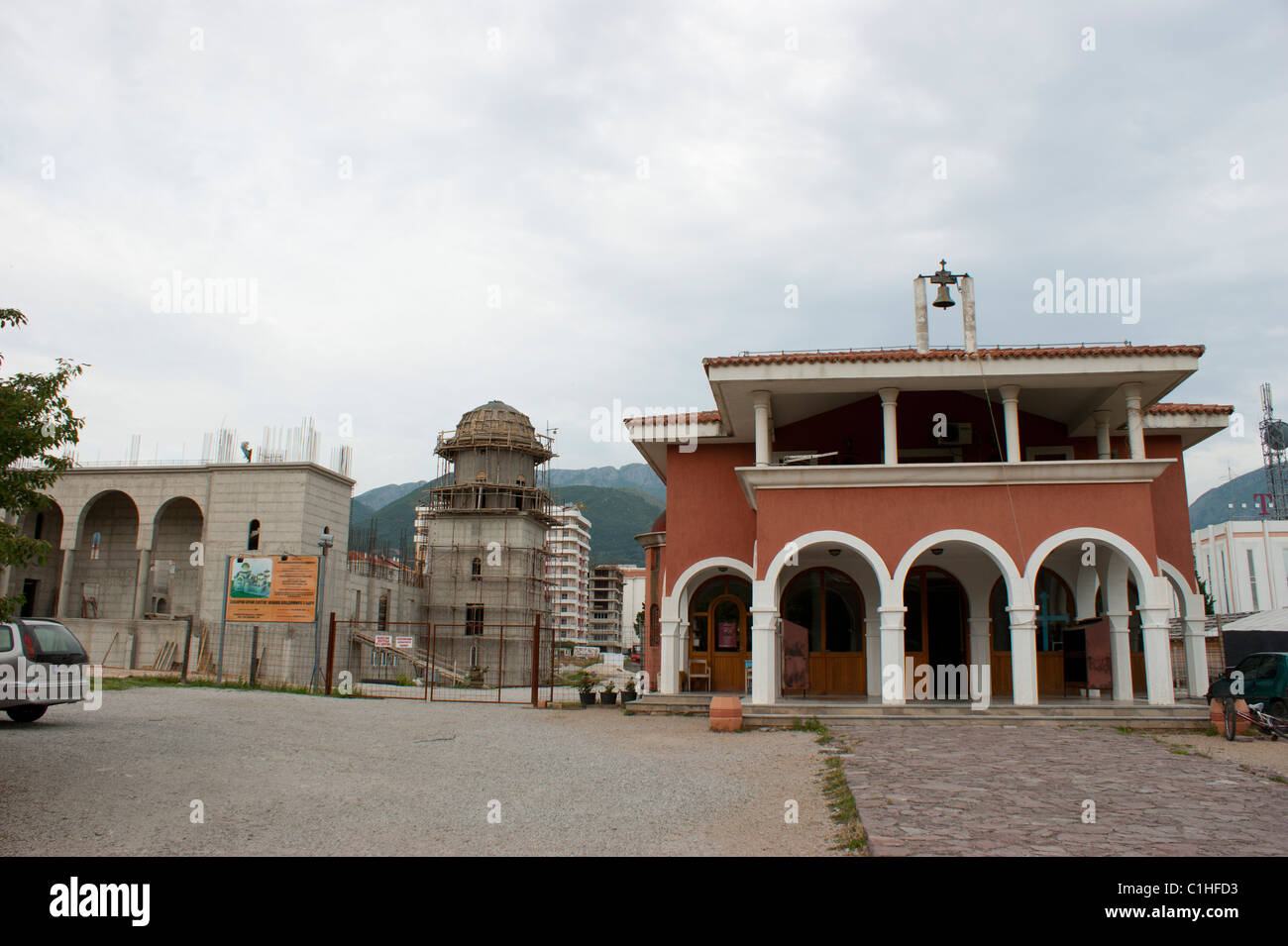 New mosque is built by Orthodox church, Bar city in Montenegro Stock ...