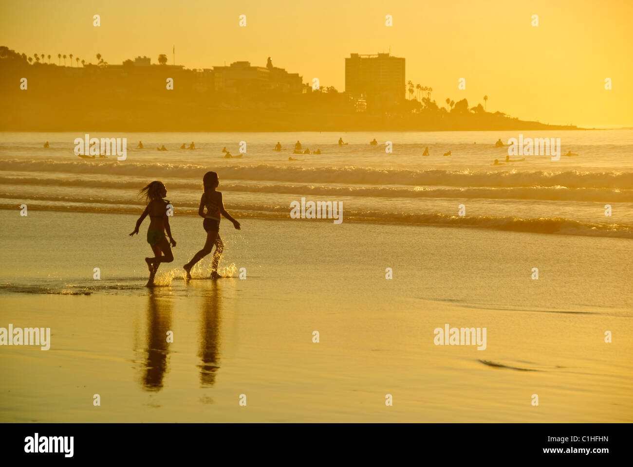 Kids playing on the beach hi-res stock photography and images - Alamy