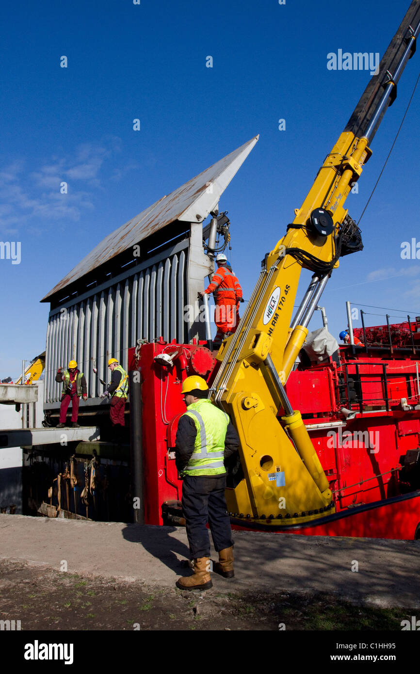Telescopic crane unloading Alstom National Grid Electrical Transformer ...