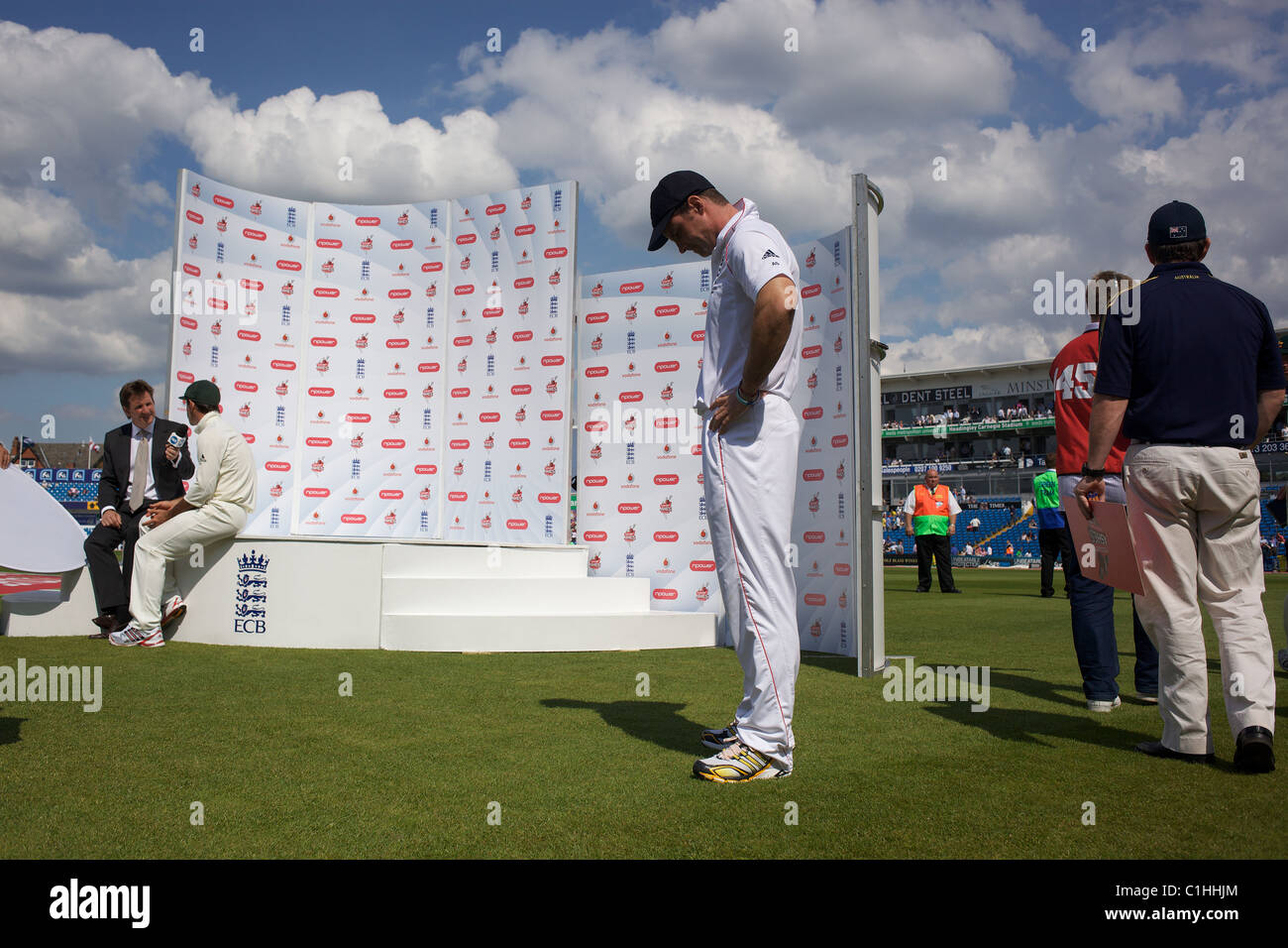 Australian captain Ricky Ponting conducts a TV interview as Andrew ...