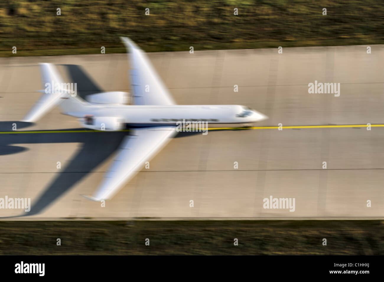 Passenger Jet landing on runway, view from helicopter, motion blur ...