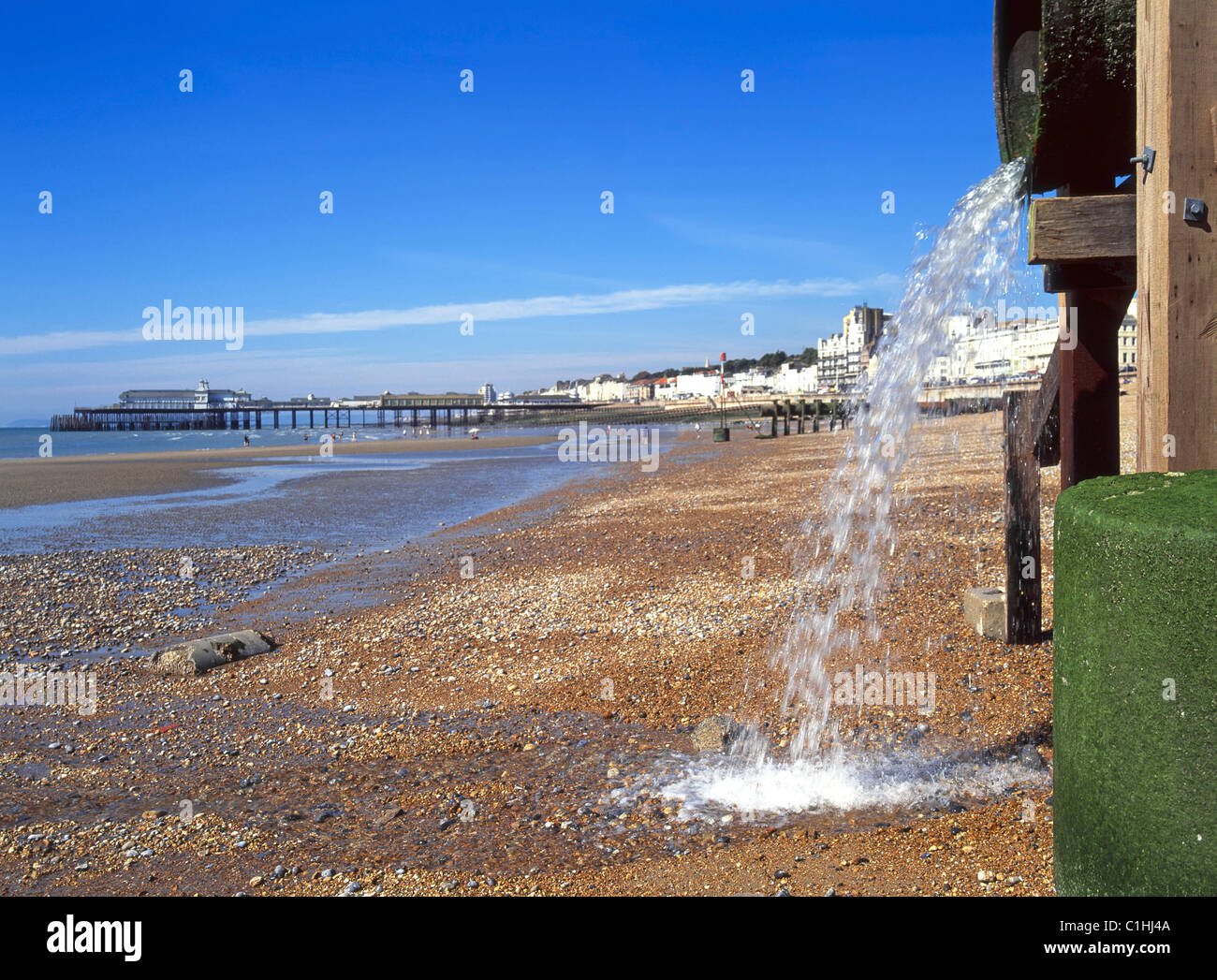 Large diameter water outfall drain pipe discharging onto beach Hastings ...