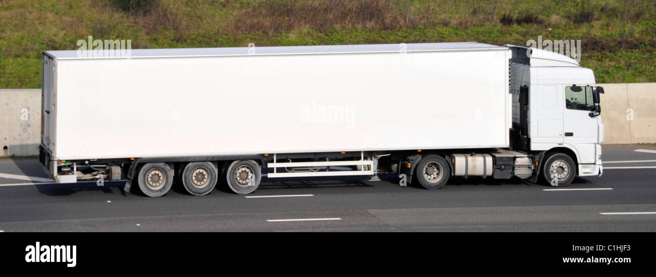 Side view white clean supply chain unmarked hgv lorry truck and ...