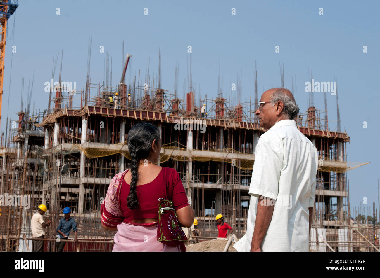 An old Indian man inspecting a construction work Stock Photo - Alamy