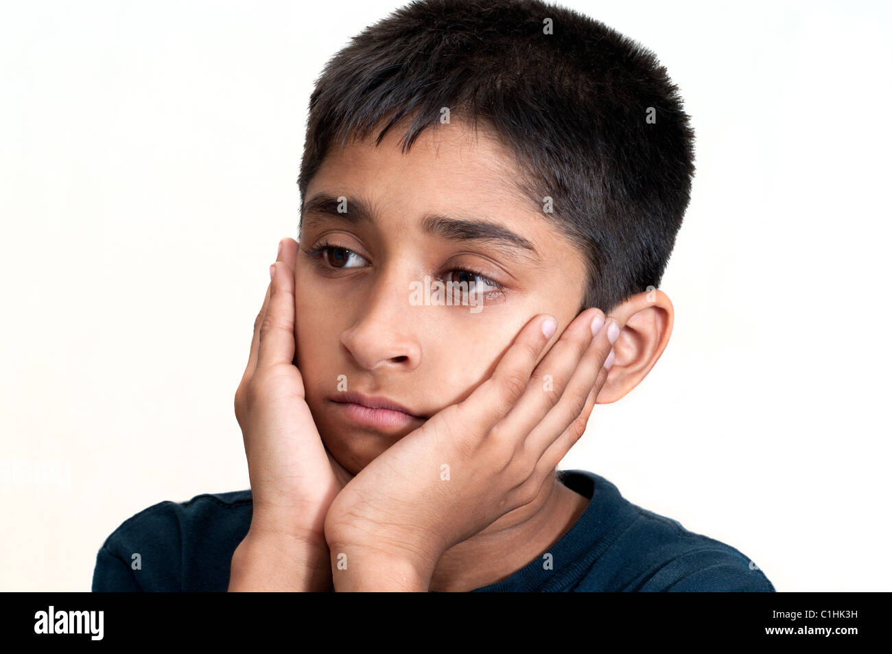 Sad indian boy hi-res stock photography and images - Alamy