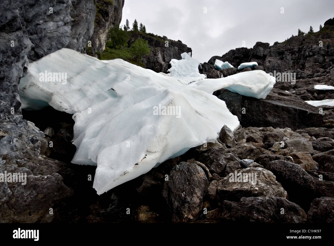 Fantastic wavy ice shapes (glacier) in Sayan mountains. Wild nature in ...