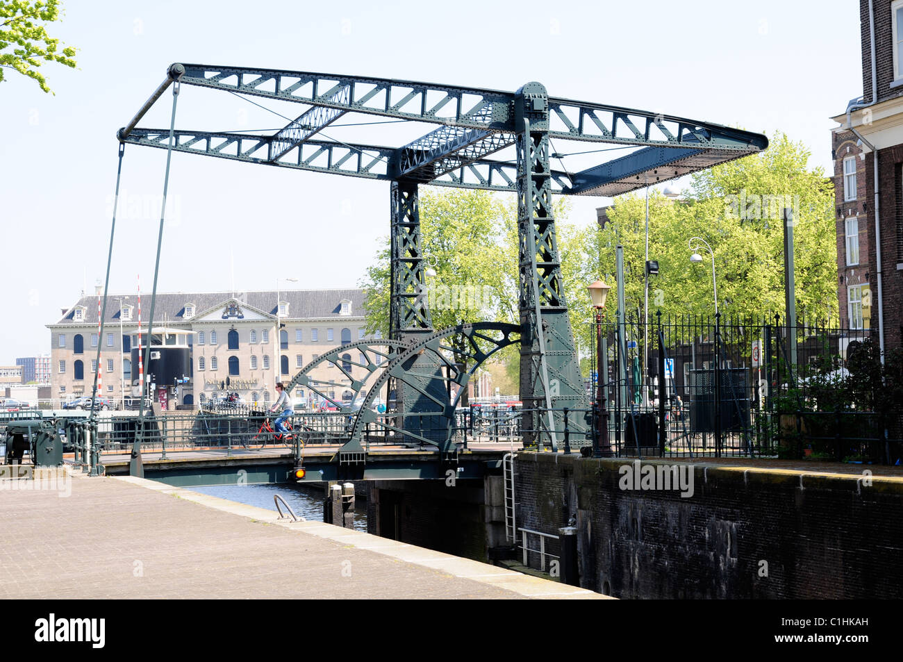 Amsterdam raising bridge over the canal Stock Photo - Alamy