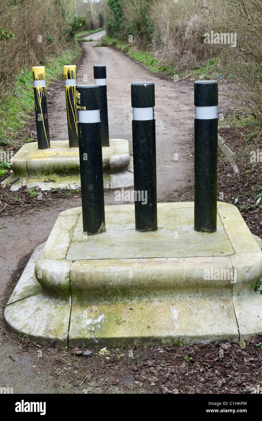 Permanent barriers to stop vehicles using a road Stock Photo - Alamy