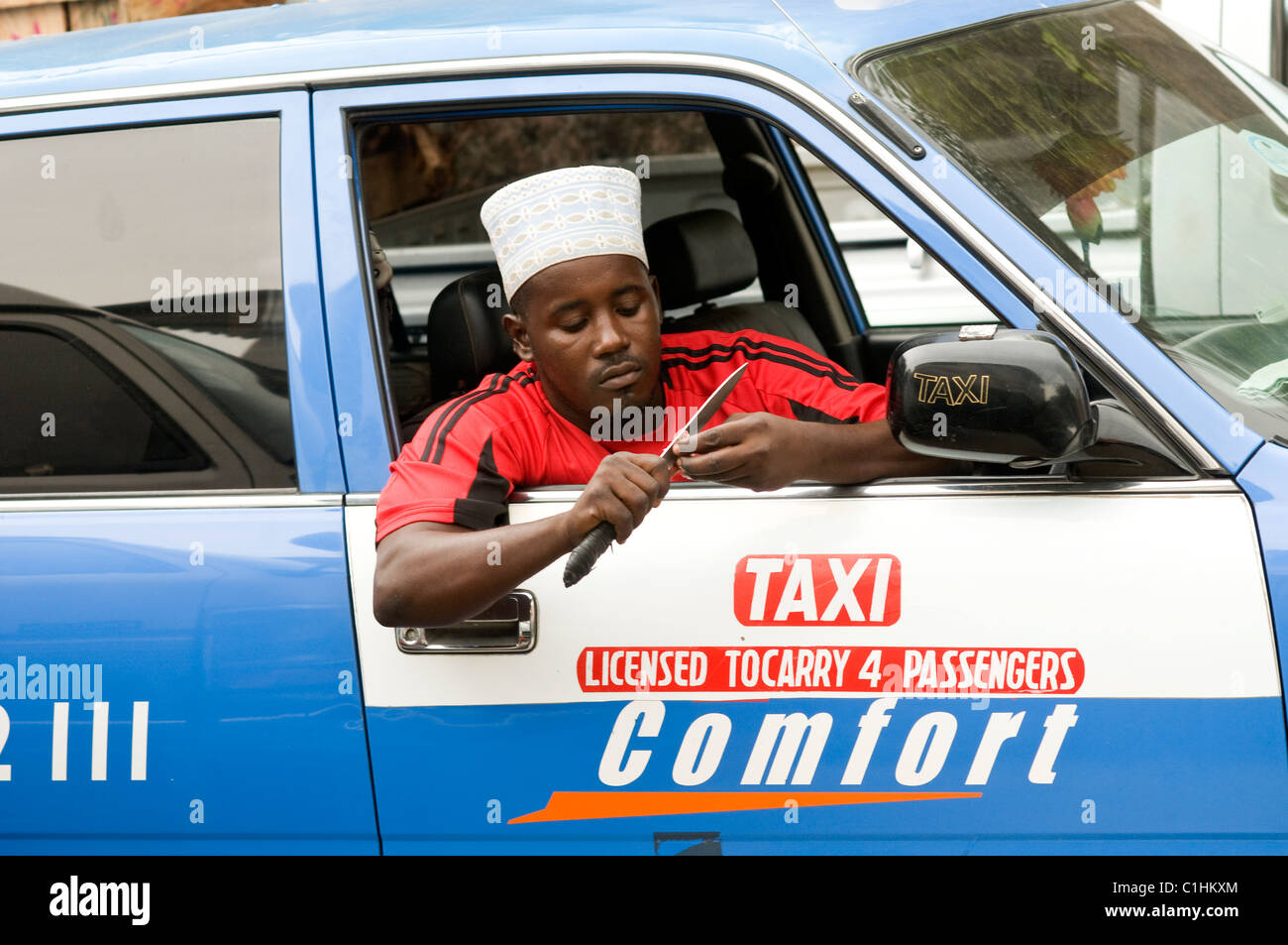 Taxi driver, Zanzibar, Tanzania Stock Photo - Alamy