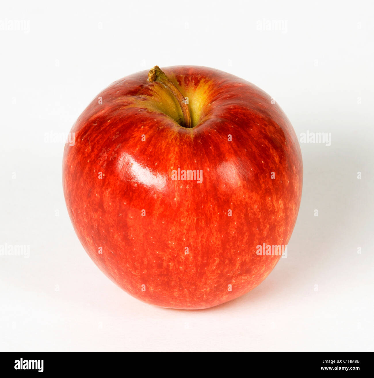 Fresh red apple with shiny skin - studio Stock Photo - Alamy