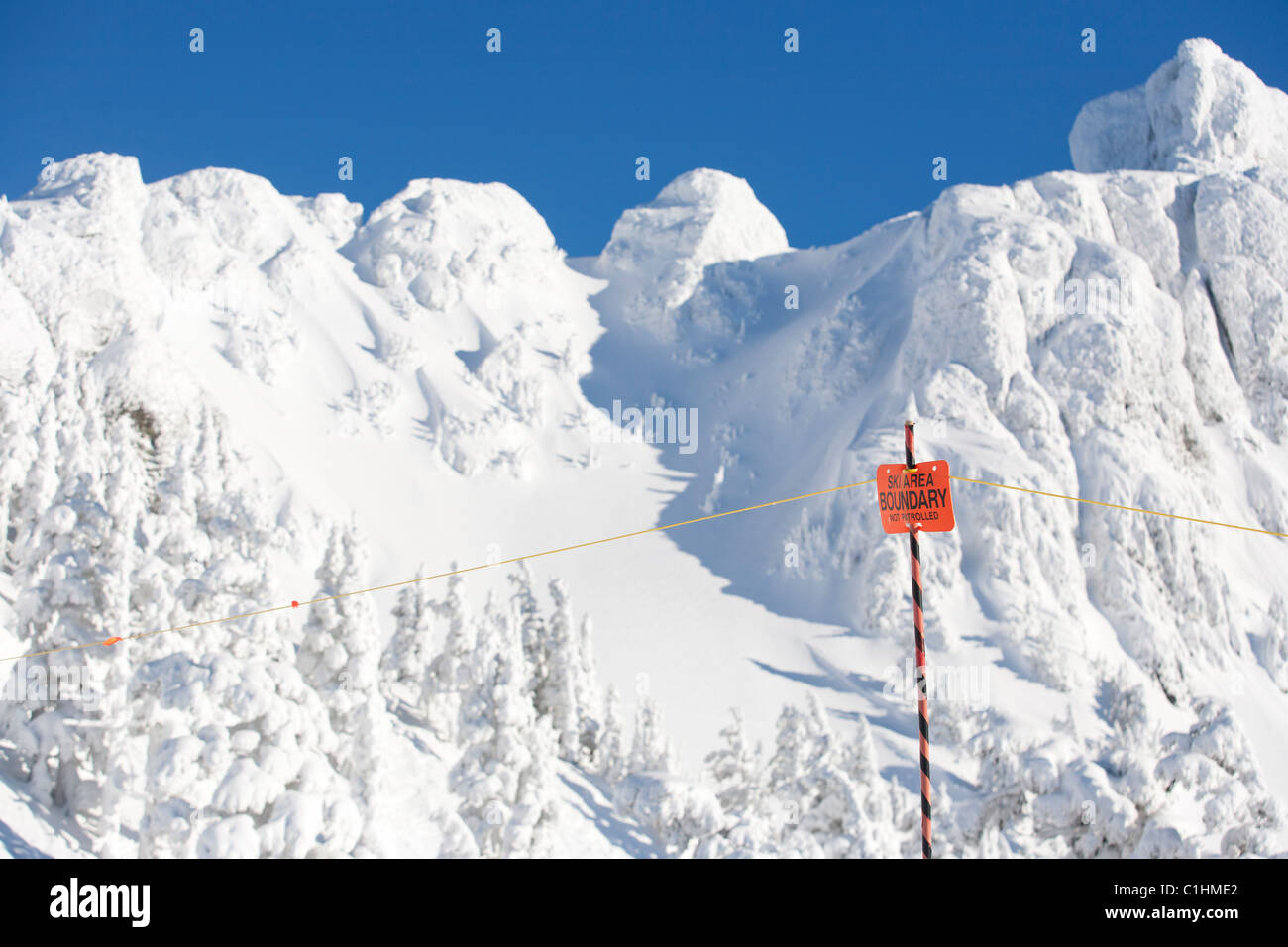 Ski area boundary sign with Mt.Cain Stock Photo - Alamy