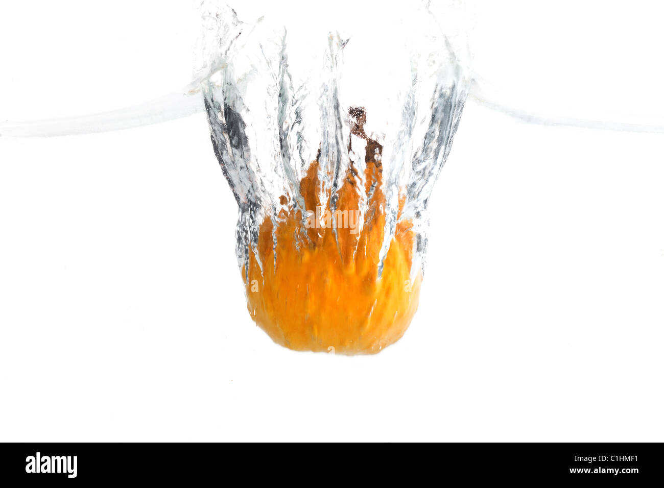 Pumpkin splash in water Stock Photo - Alamy