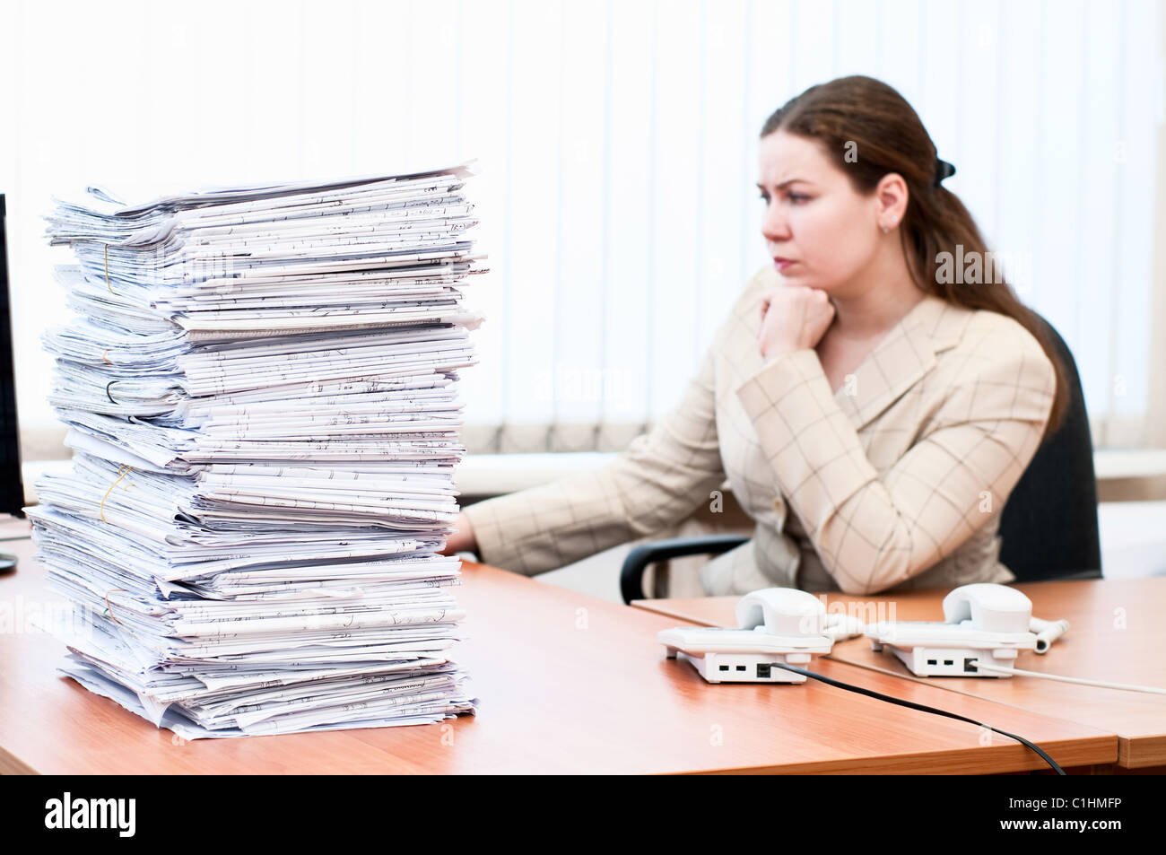Girl filing paper hi-res stock photography and images - Alamy