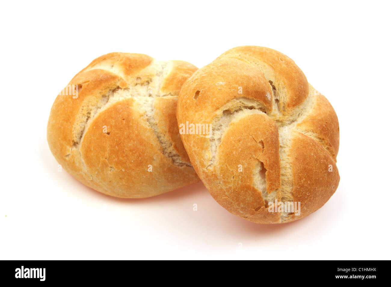 Bread and buns isolated against a white background Stock Photo - Alamy